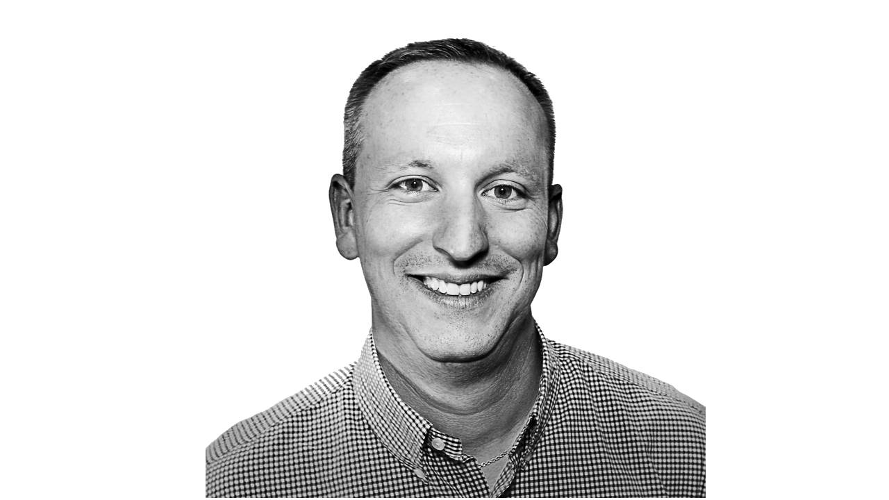 Voitanos - About Andrew Connell